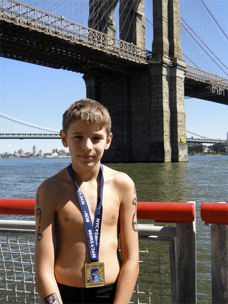 Mercer Island 11-year-old is youngest ever to finish New York swimming ...